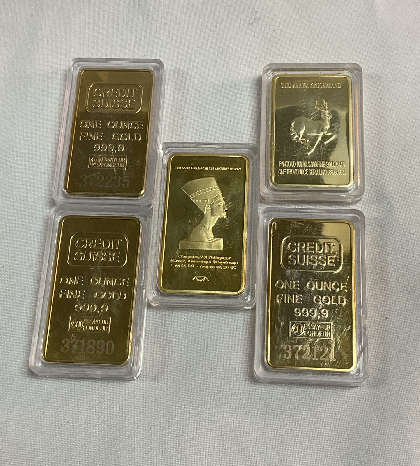 Three Replica commemorative credit suisse gold bars one Kruger and and ...