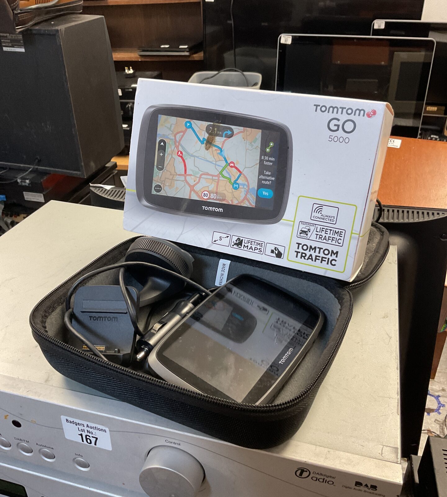 Tomtom go 5000 satnav with case – Badgers Auctions