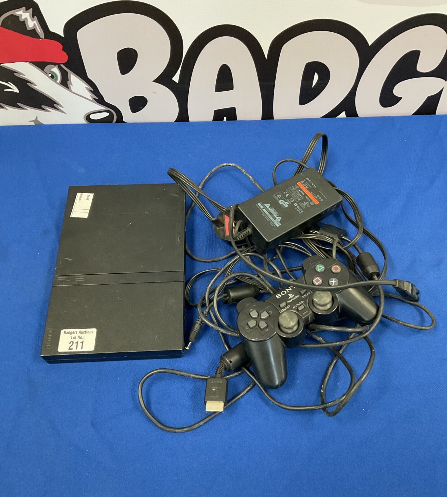 Sony PlayStation 2 slim console bundle – Badgers Auctions