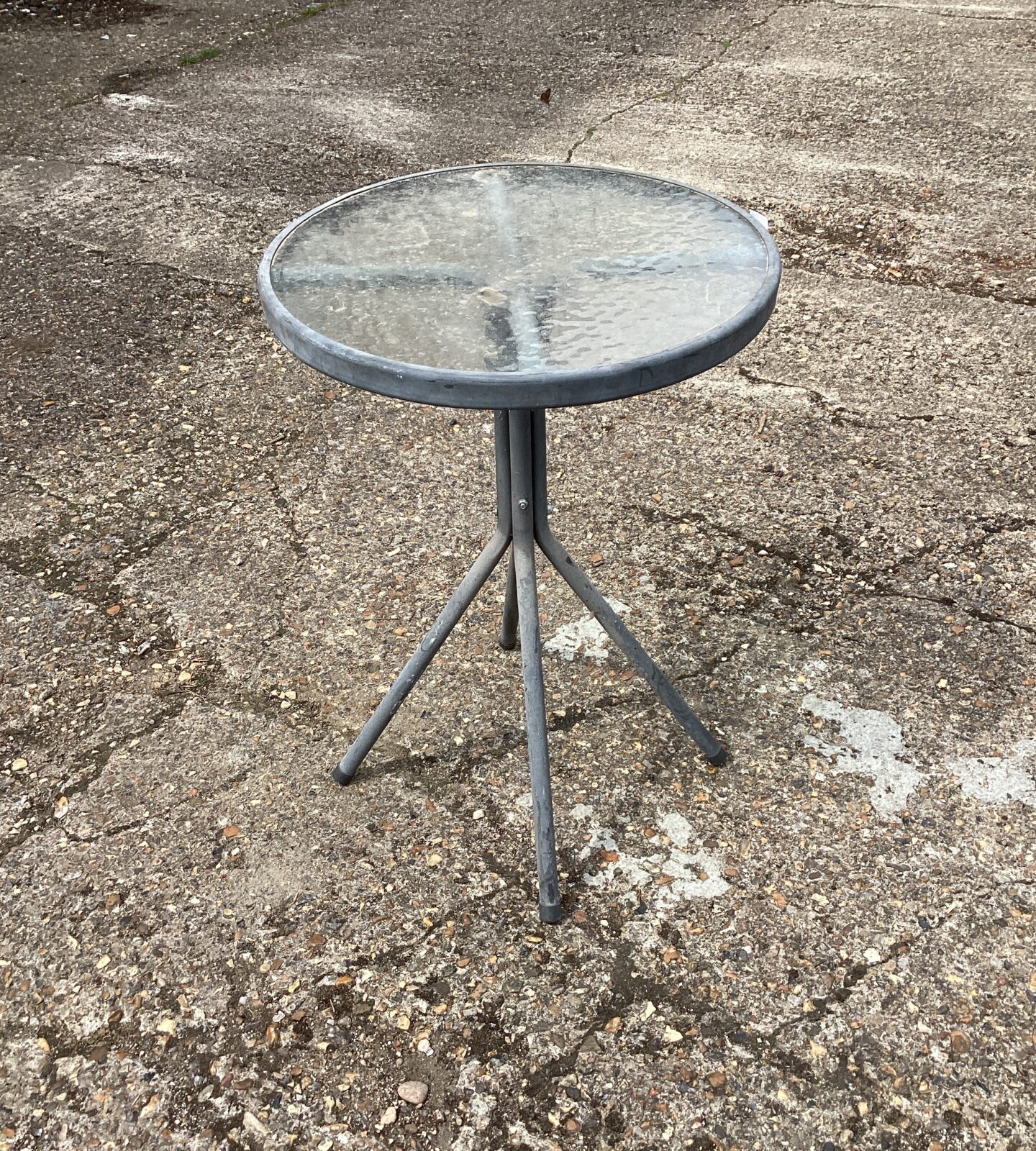 Small Glass topped garden table – Badgers Auctions