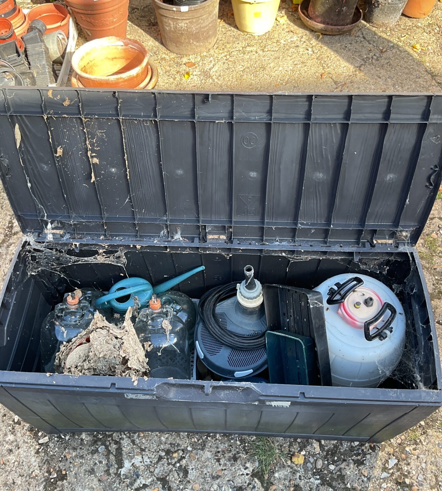 Plastic garden storage box w/ contents – Badgers Auctions