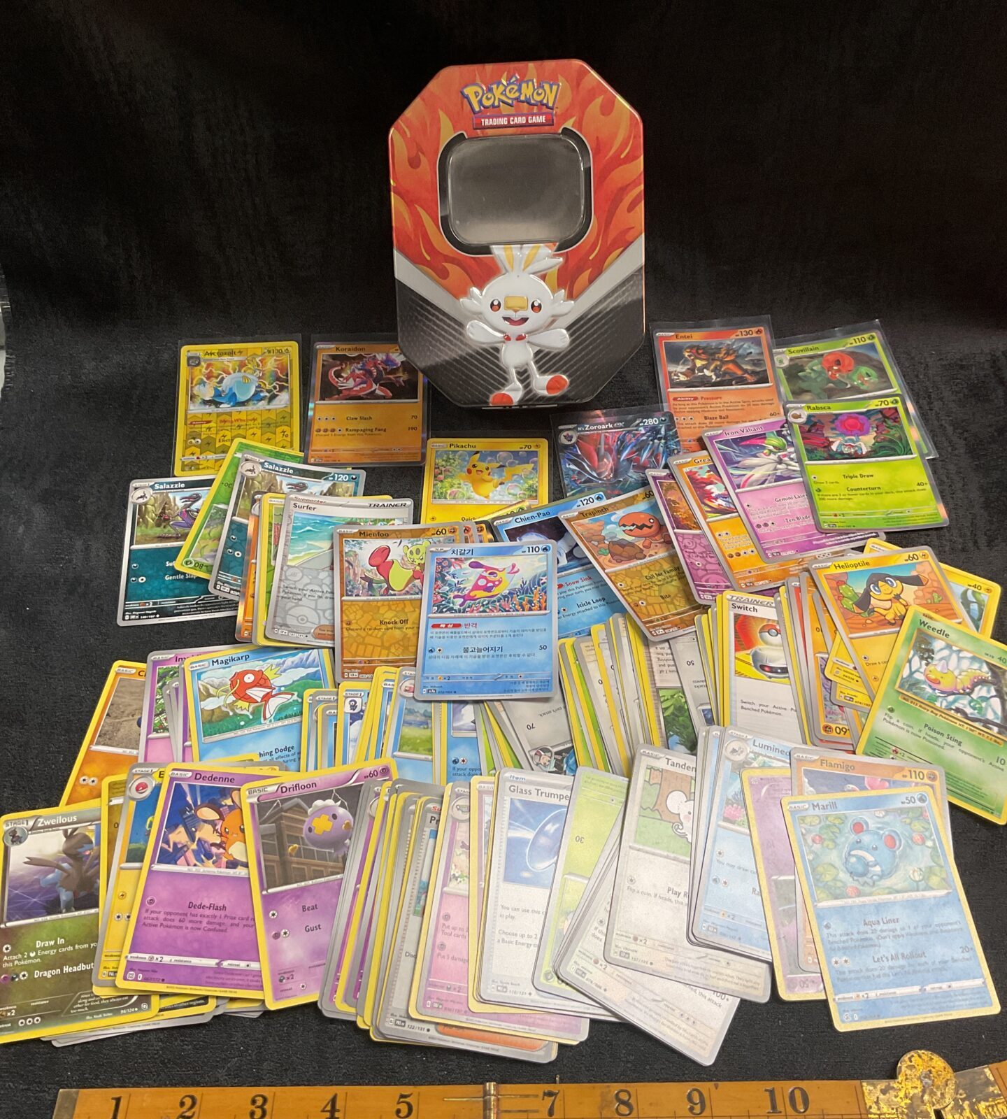 Large tin Of Pokemon cards – Badgers Auctions