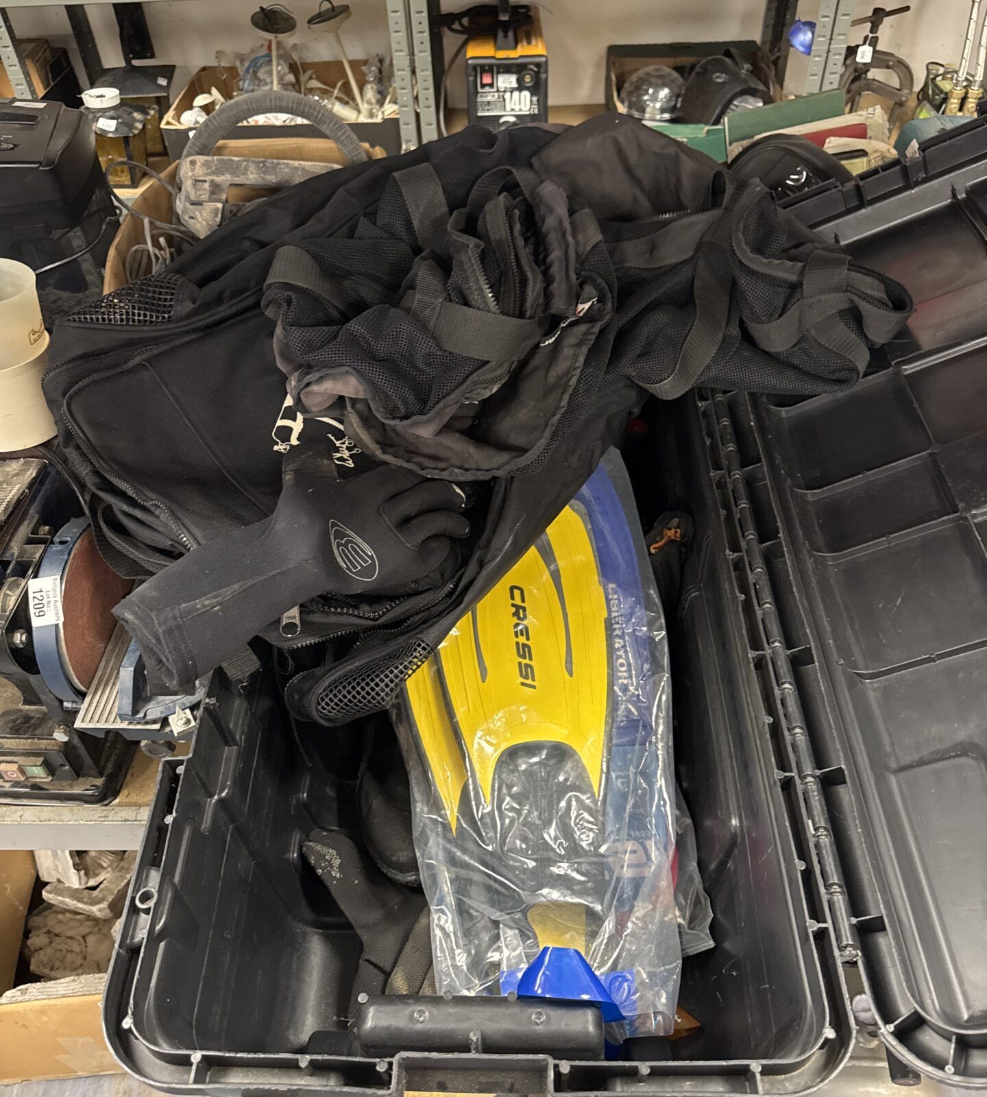 Large box of assorted diving gear in transit case – Badgers Auctions