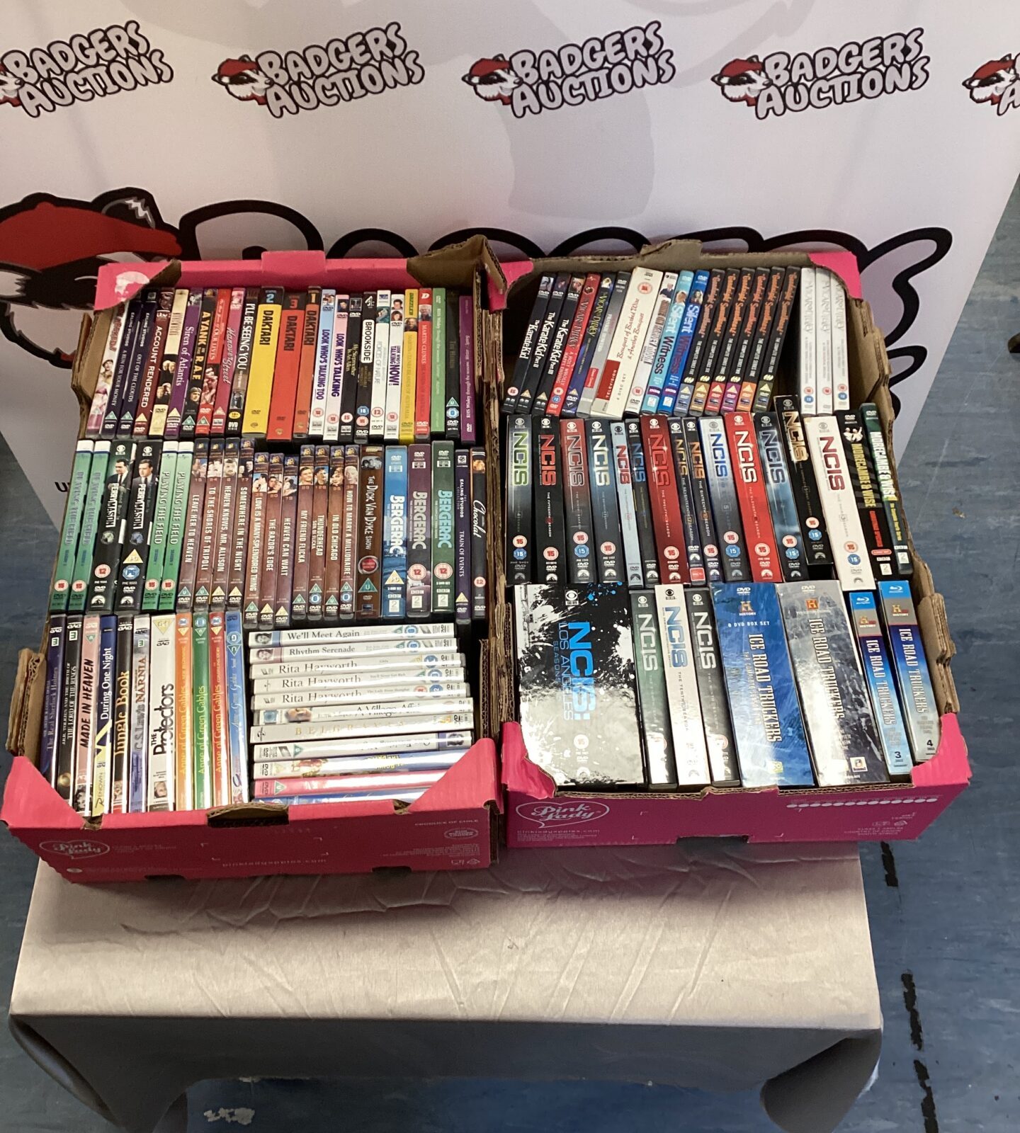 Two boxes of dvd boxsets inc ncis, the karate kid & the vicar of dibley ...