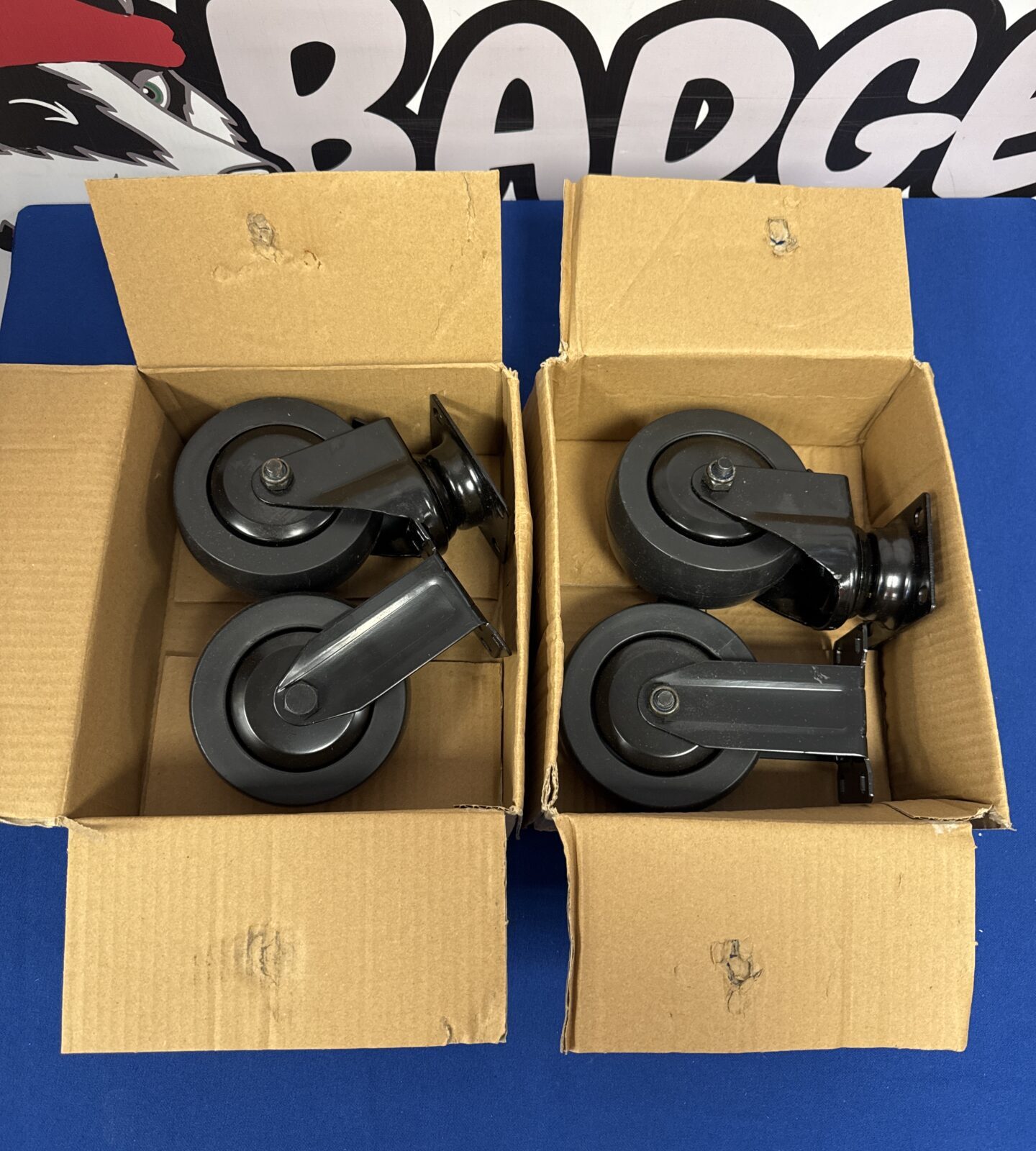 Four new large castor wheels – Badgers Auctions