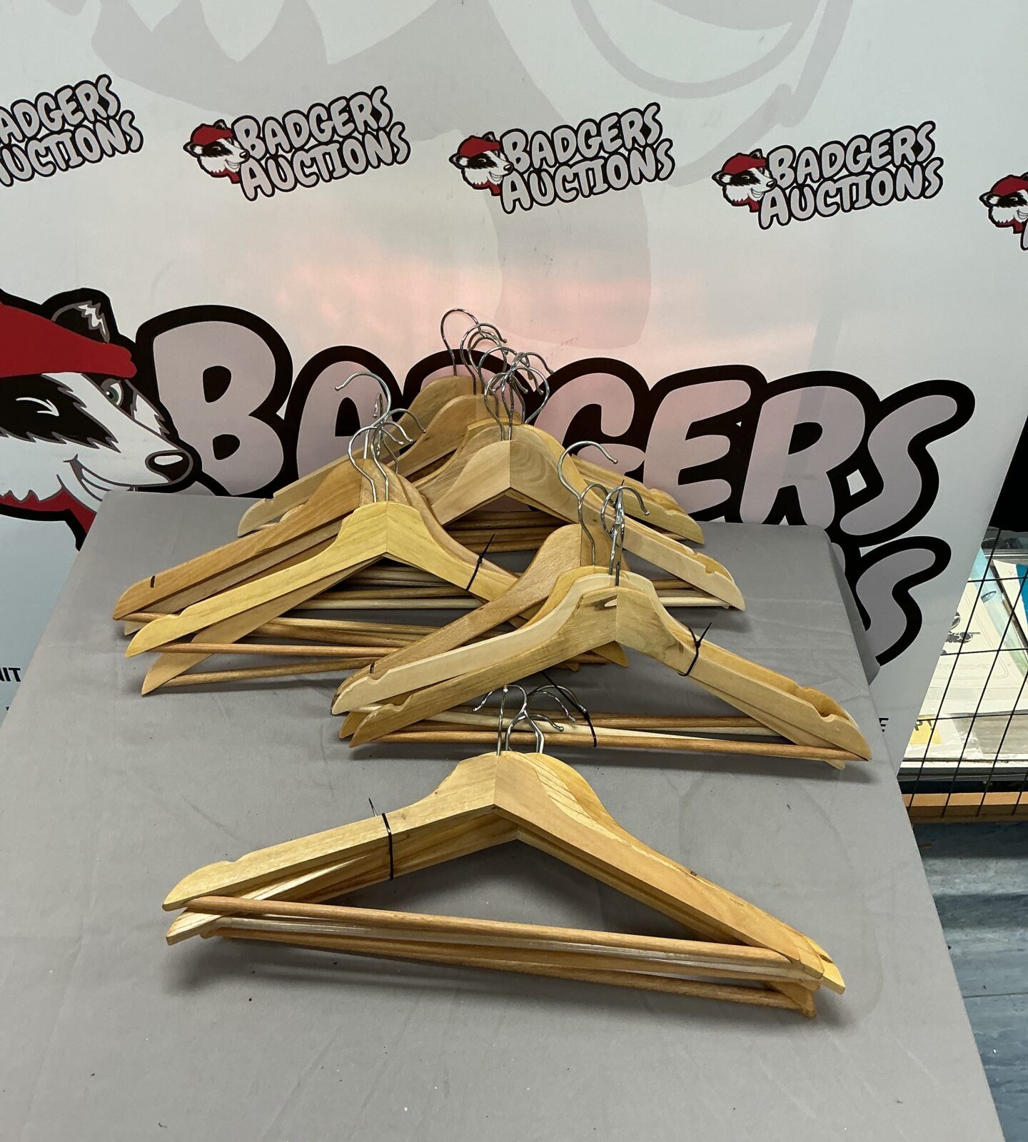 Quantity of Wooden Clothes Hangers – Badgers Auctions