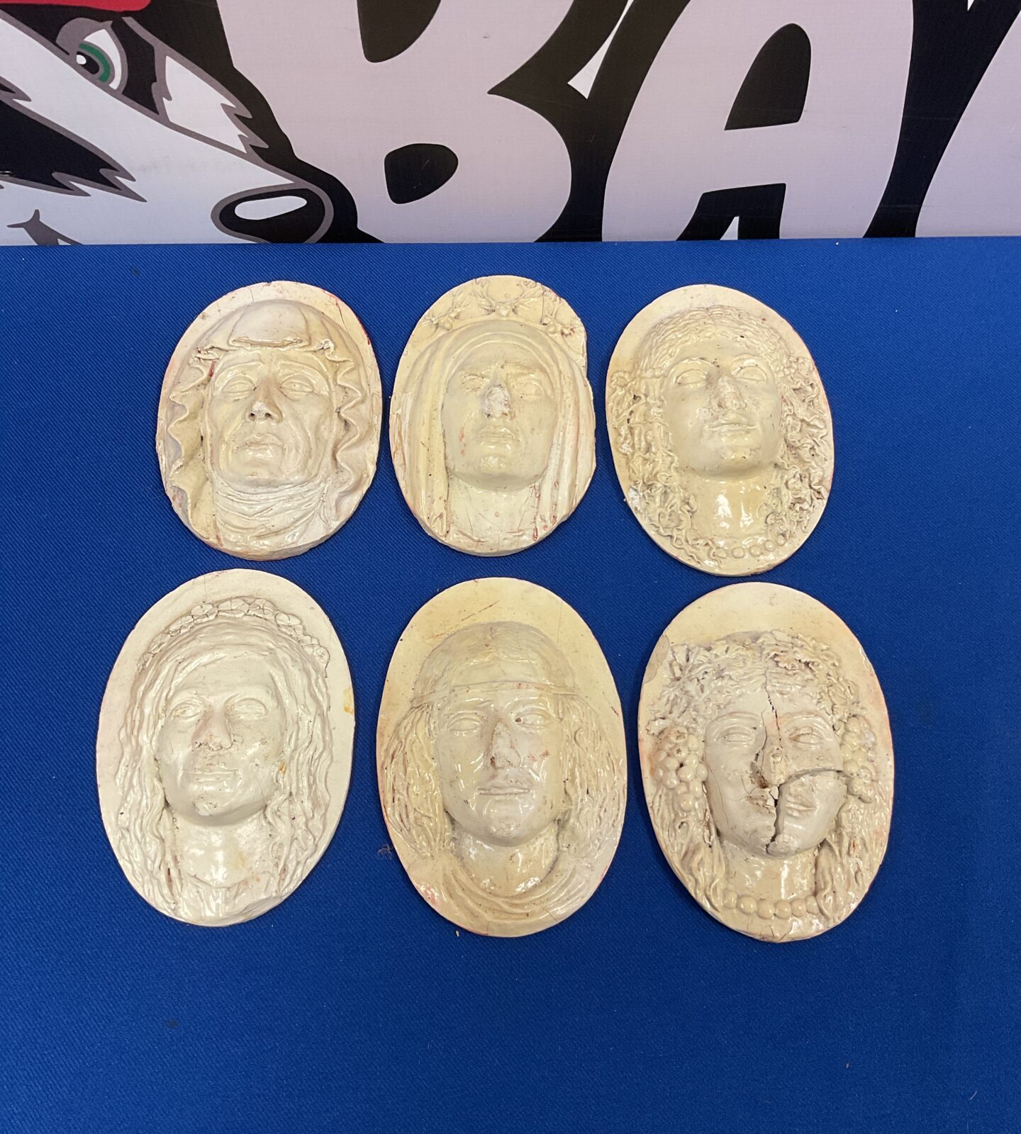 Set of six antique plaster faces – Badgers Auctions