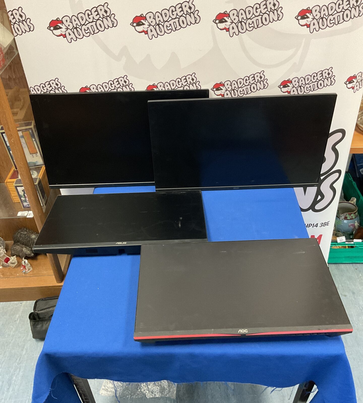 Four computer monitors, two 27” and two 24” incl. Asus, AOC, IIISI ...