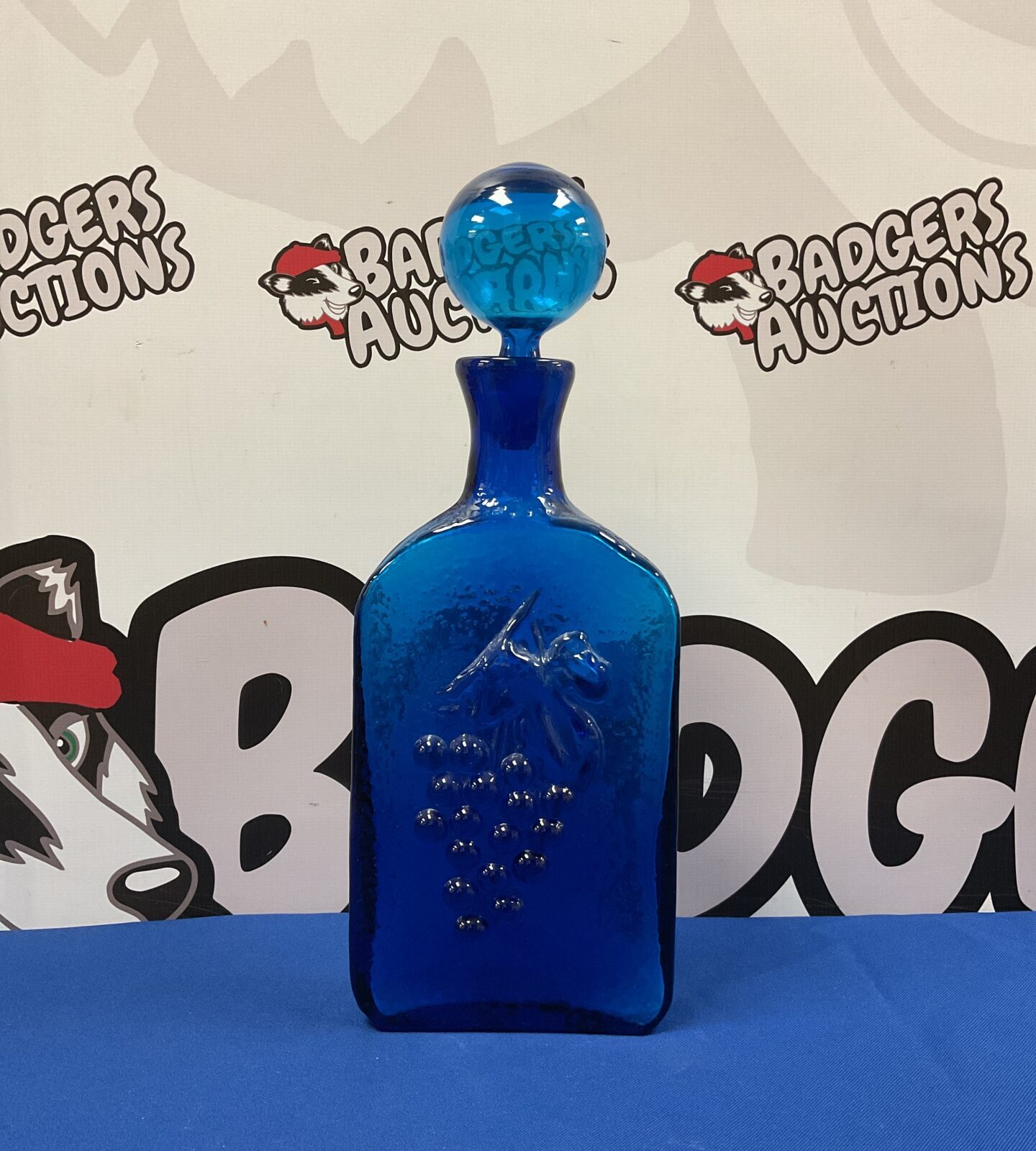 Large cobalt blue glass bottle with grape design on front 15” tall ...