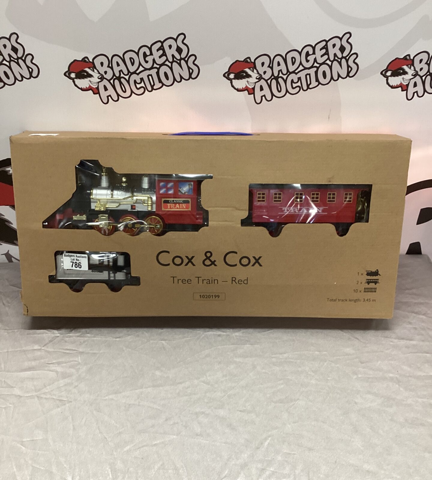 Cox and Cox tree train in the red boxed – Badgers Auctions