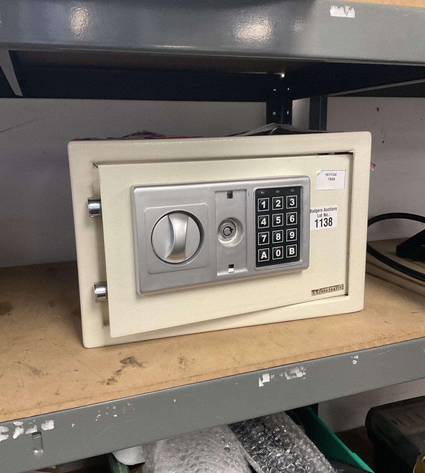Electric personal valuables safe with key – Badgers Auctions