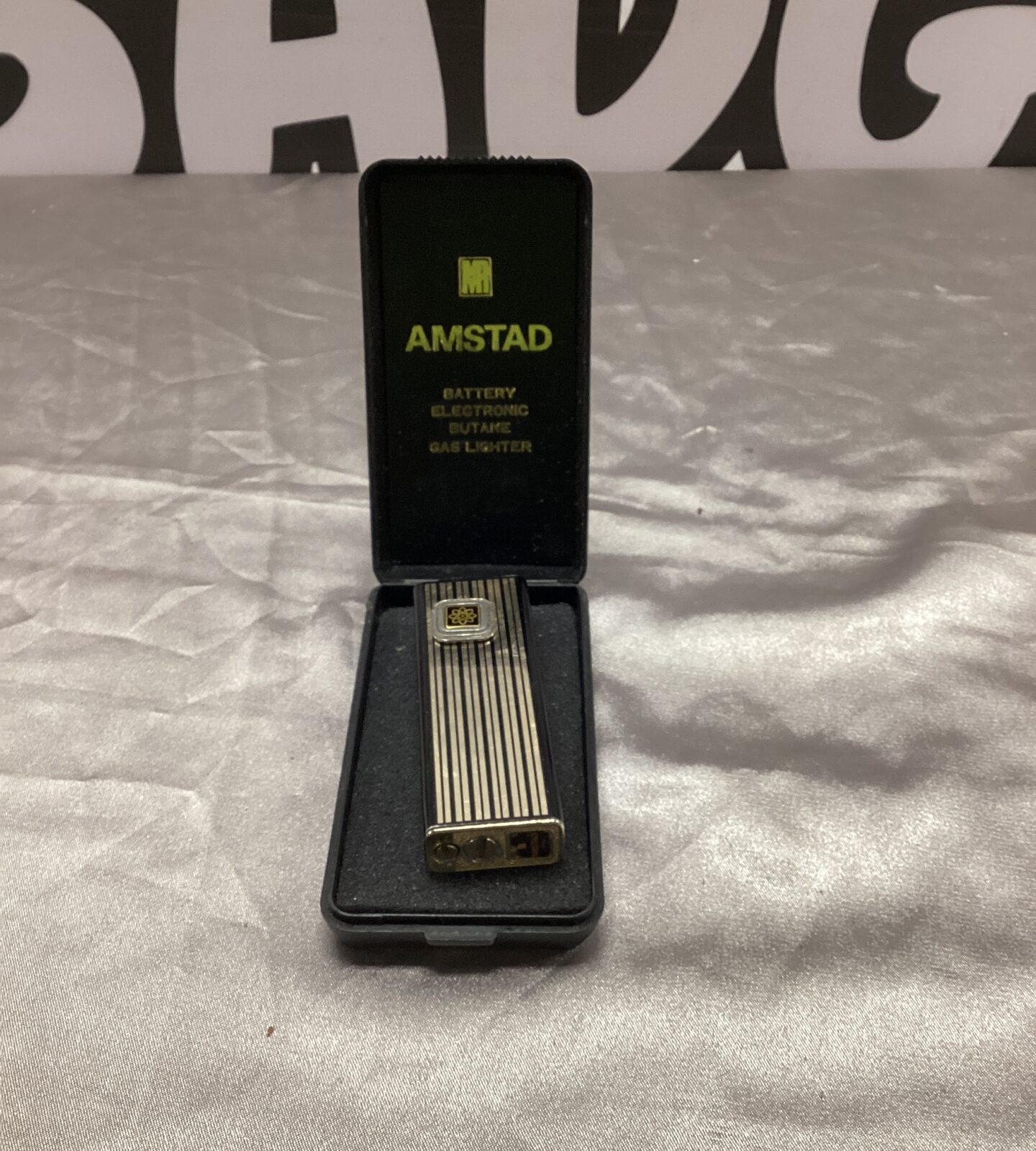 Amstad battery electronic butane lighter – Badgers Auctions