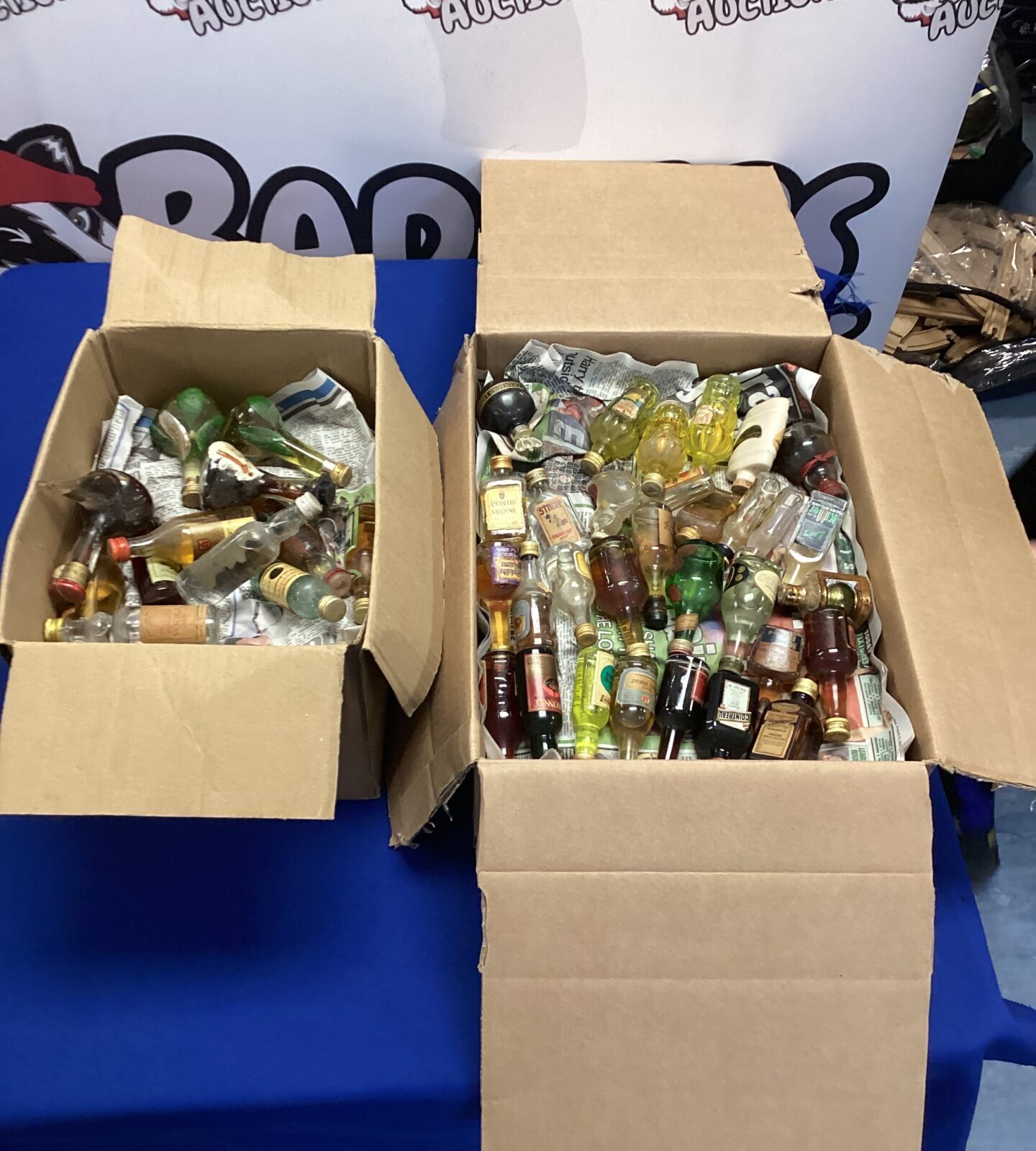 Two boxes full of alcohol miniature bottles with contents – Badgers ...