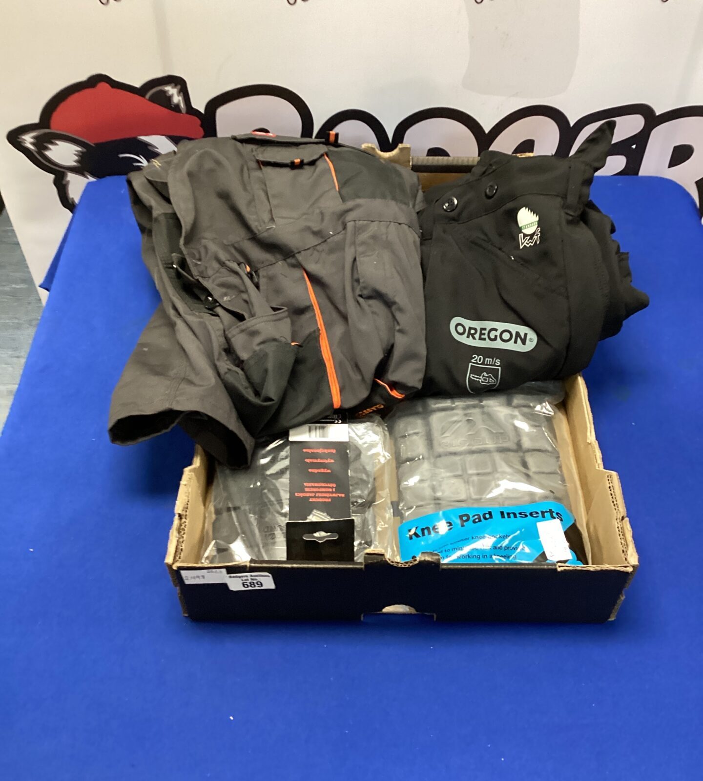 Two pairs of chainsaw safety trousers inc oregon & artmas with two ...