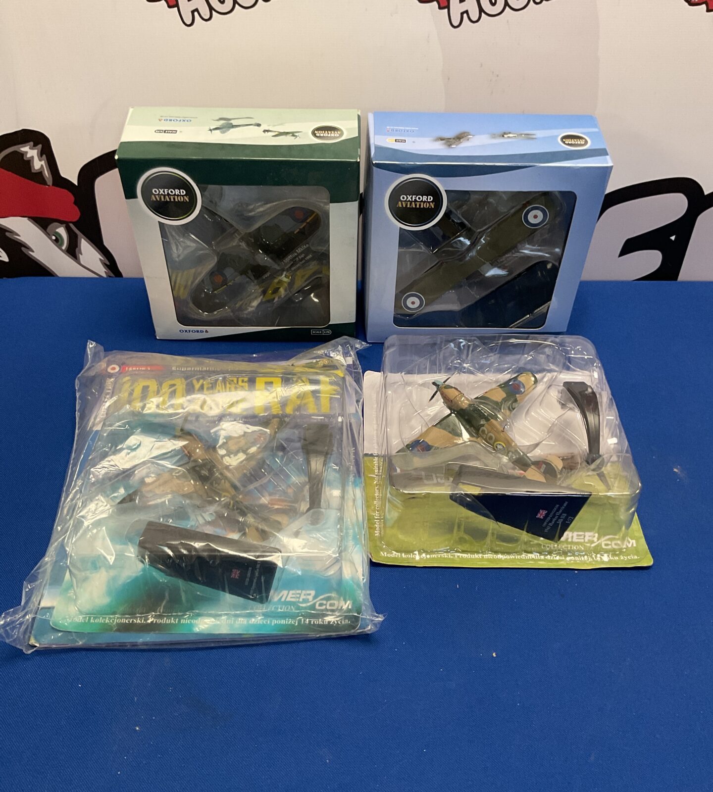 Box of four oxford aviation fighter plane models – Badgers Auctions