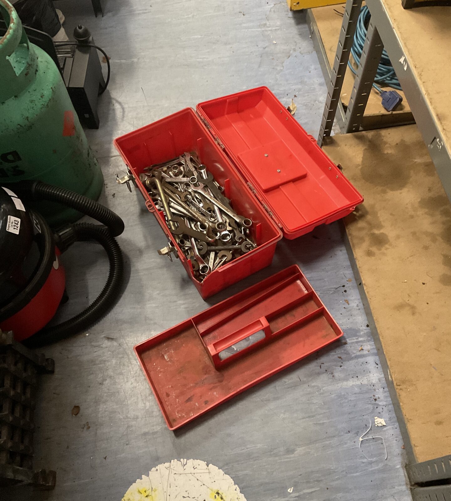 Plastic toolbox with spanners contents – toolbox has damage to corner ...