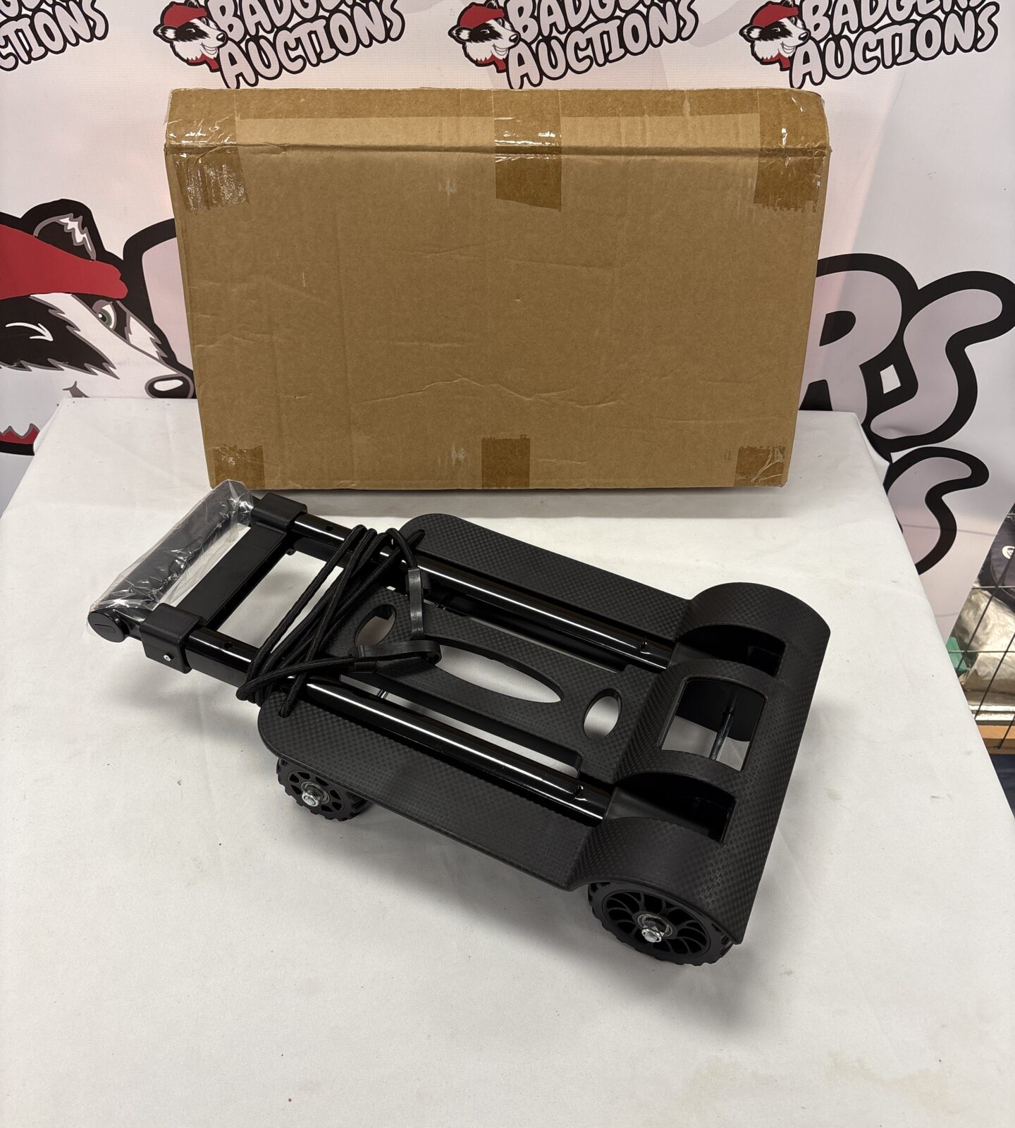 New portable trolley in box – Badgers Auctions