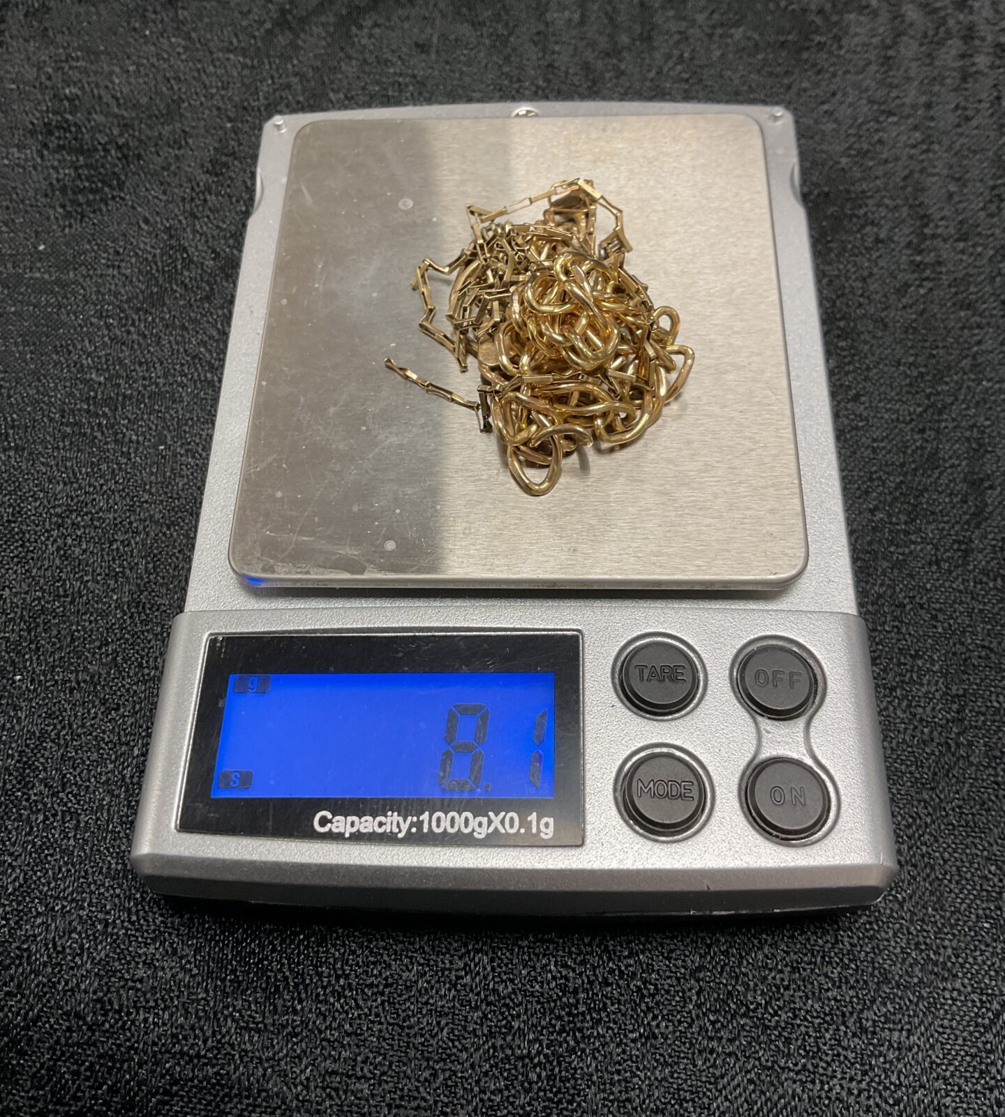 8g of Scrap 9ct gold – Badgers Auctions