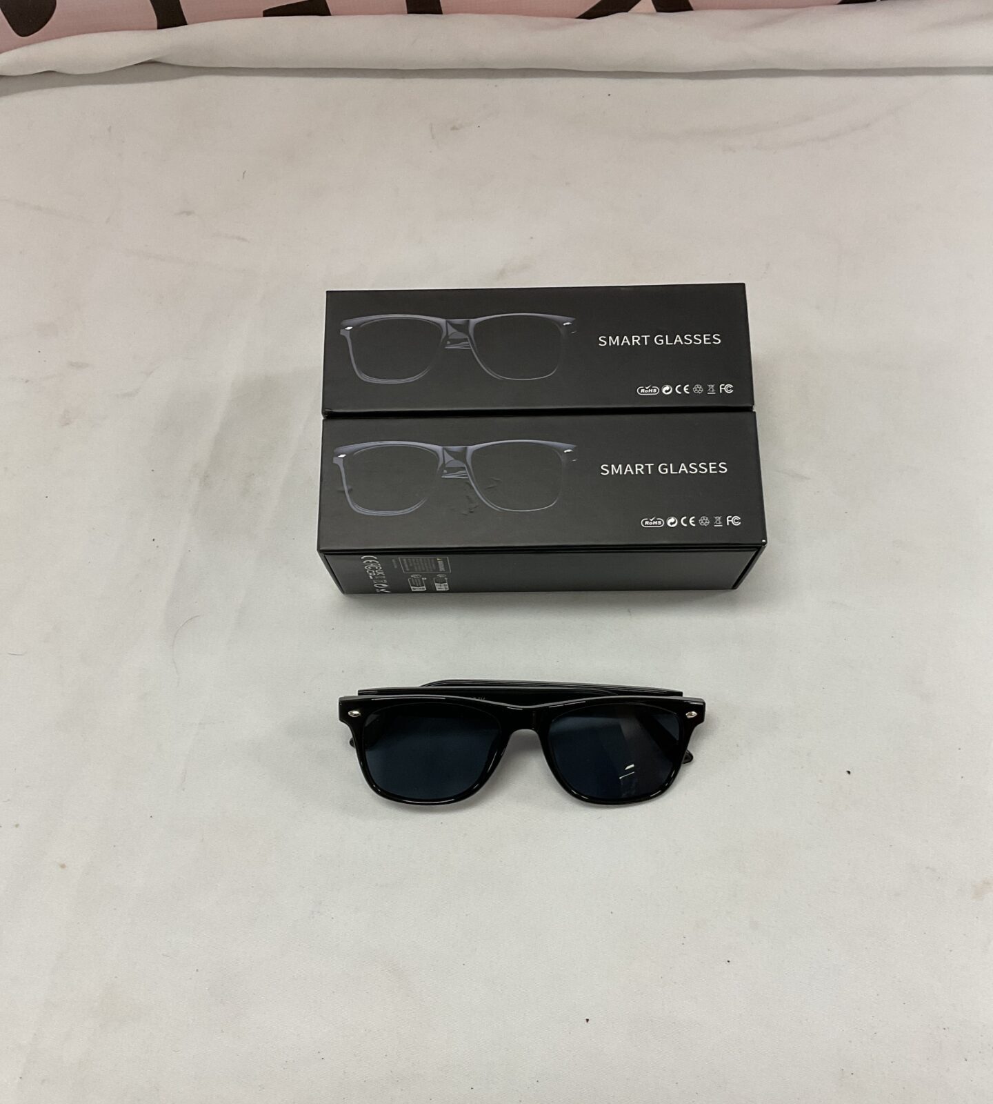 Two pairs of Smart Glasses – Badgers Auctions
