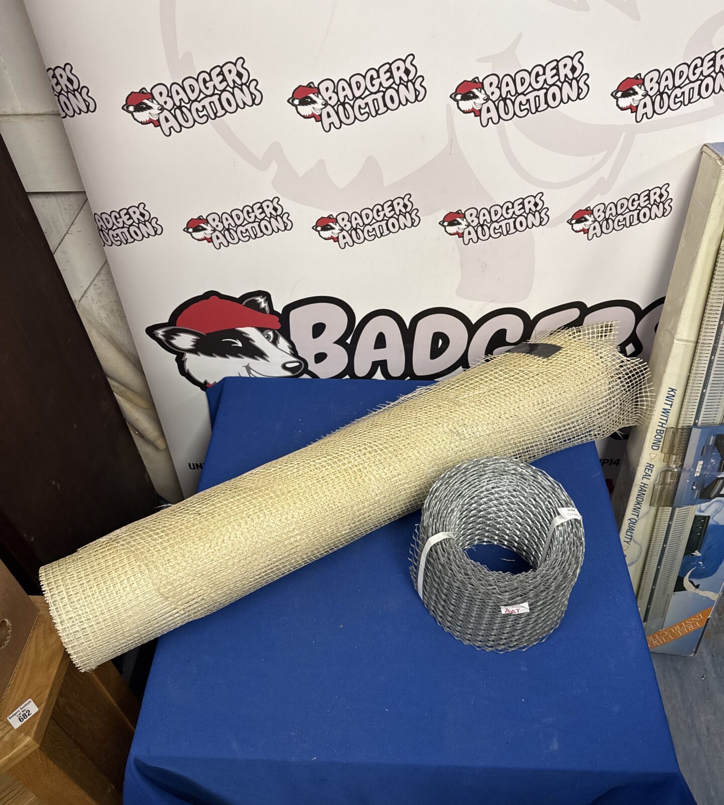 New roll of stainless steel mesh with roll of exterior fibreglass mesh ...