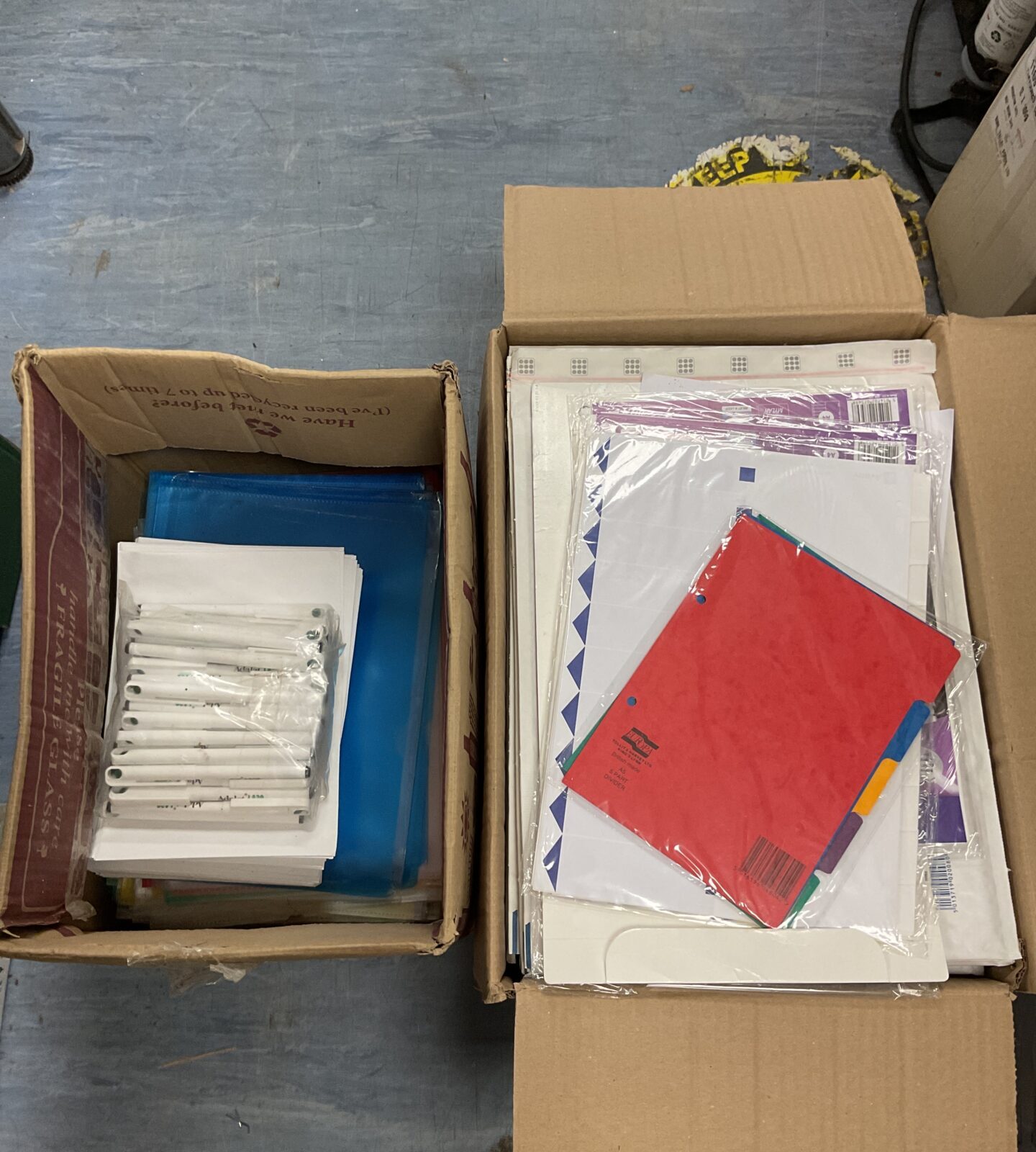 Boxes of plastic bags, pens and mail bags – Badgers Auctions