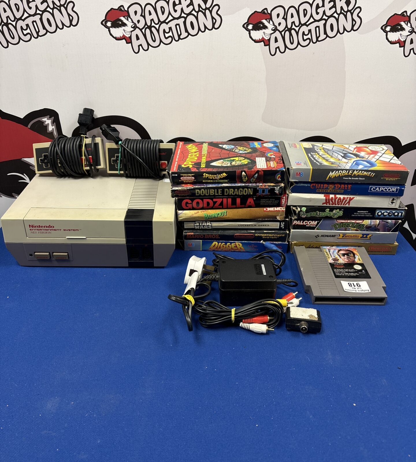 Nintendo NES With Cables And Games – Badgers Auctions
