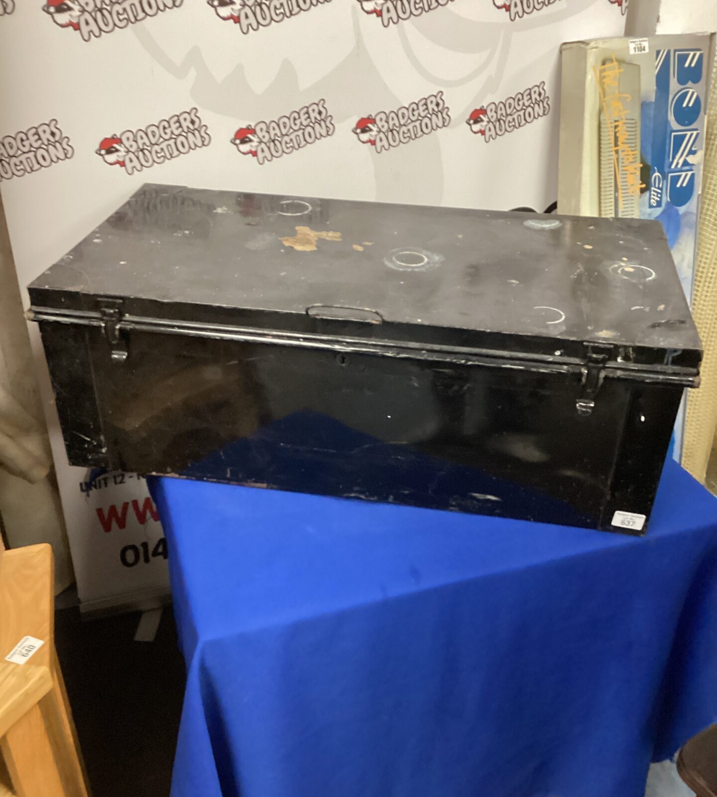 A large metal lock box, no key – Badgers Auctions