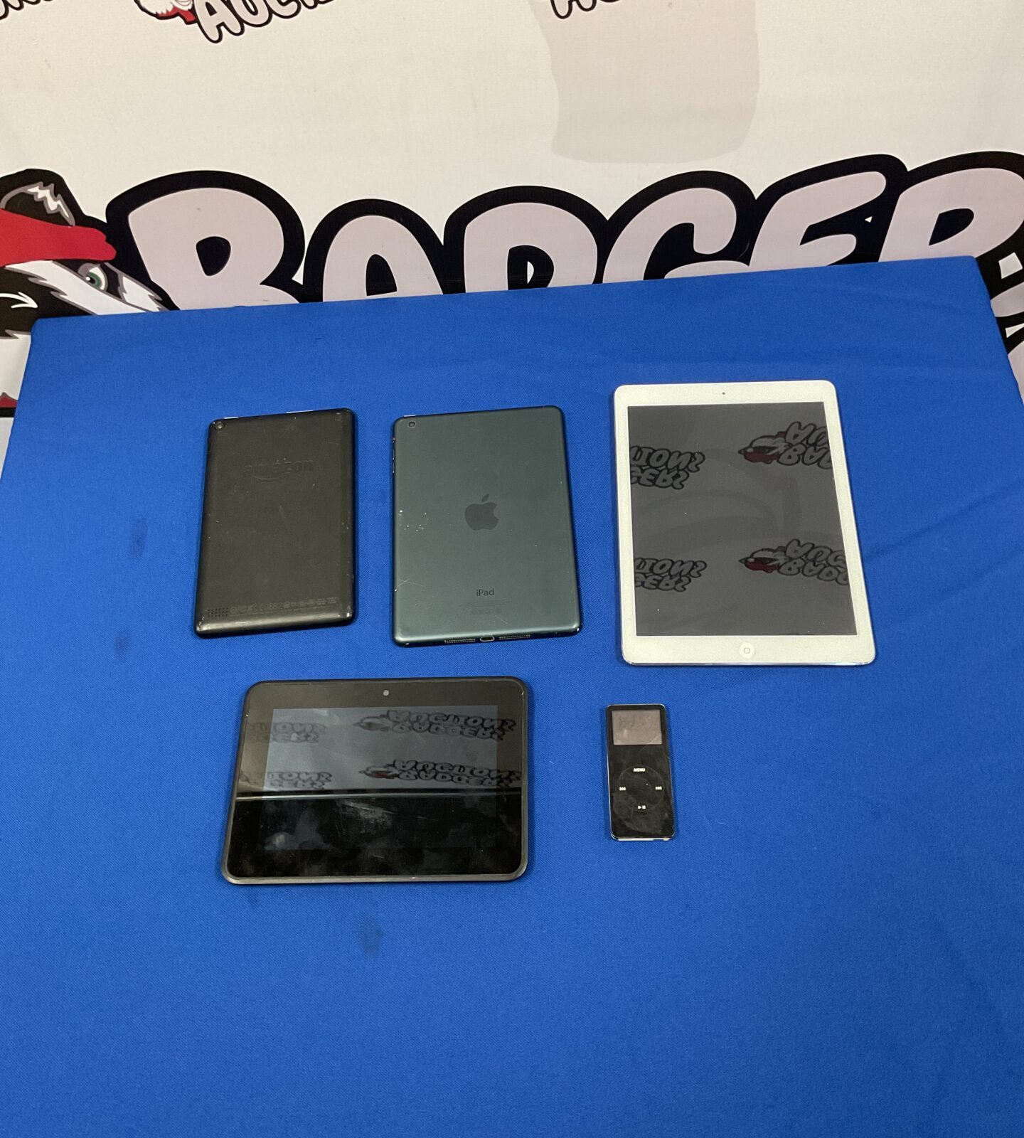 Two Apple iPads, two Amazon tablets, and an iPod model A1137 – Badgers ...