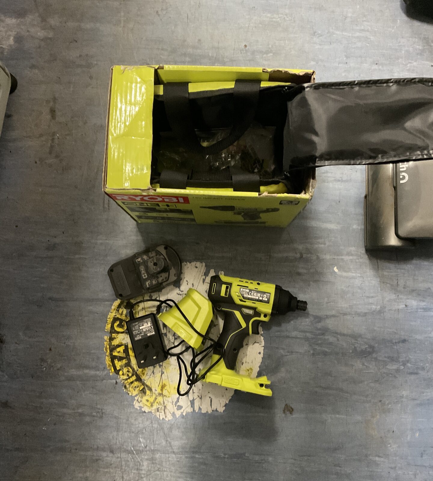 Ryobi one+ cordless impact driver with battery & charger – Badgers Auctions