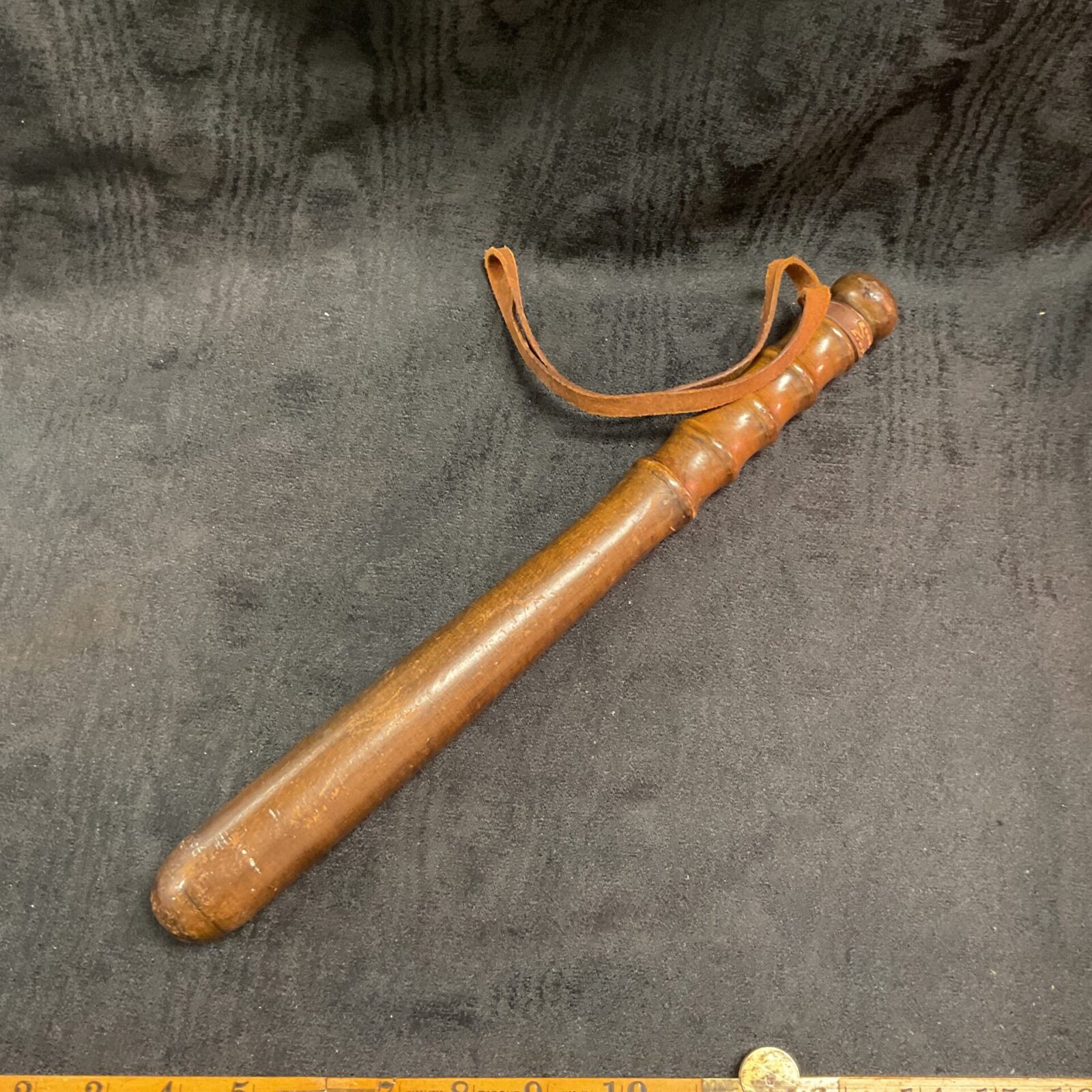 Obsolete police truncheon with wrist strap – Badgers Auctions