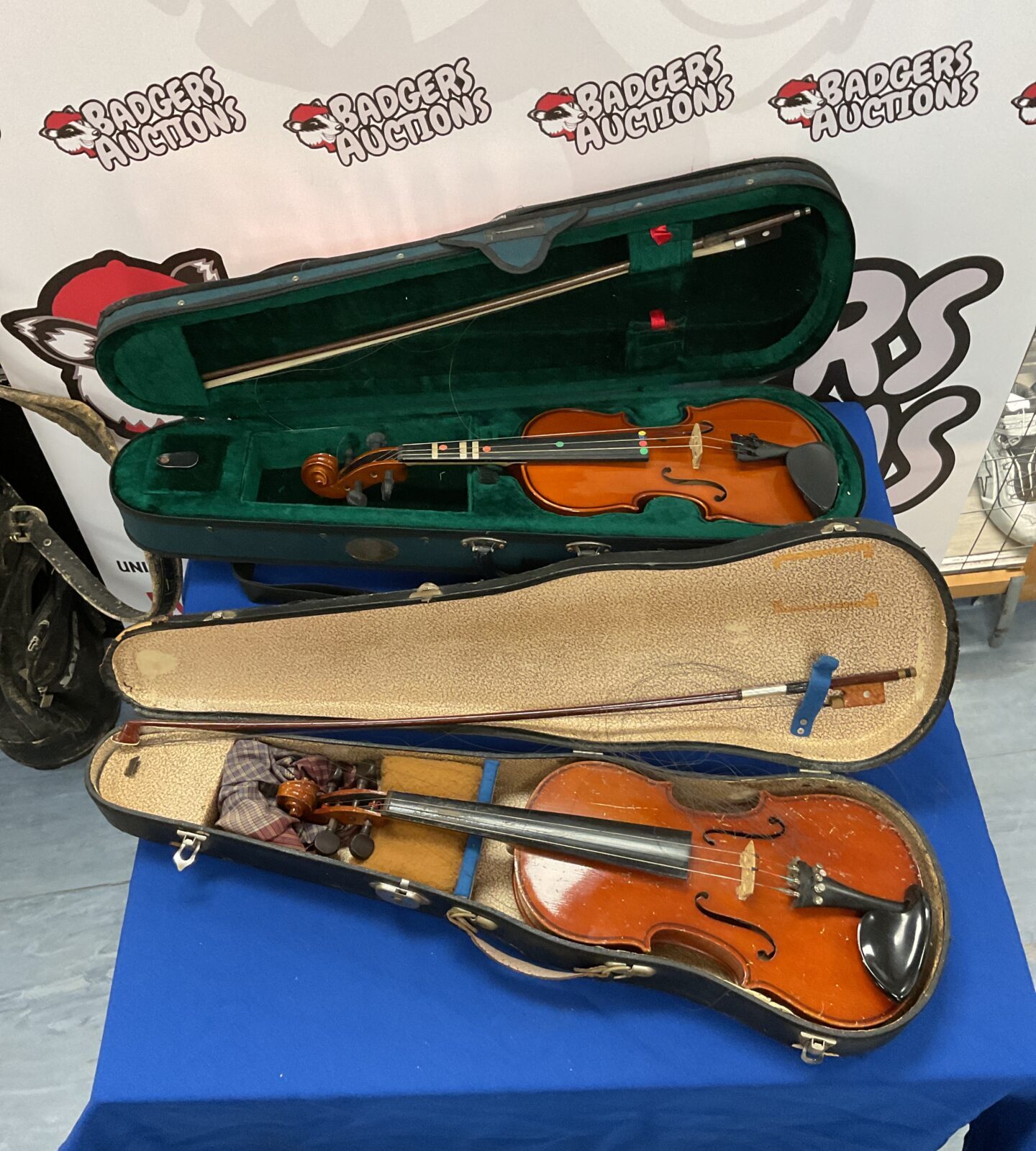 Two violins for restoration in cases including the stentor student ...