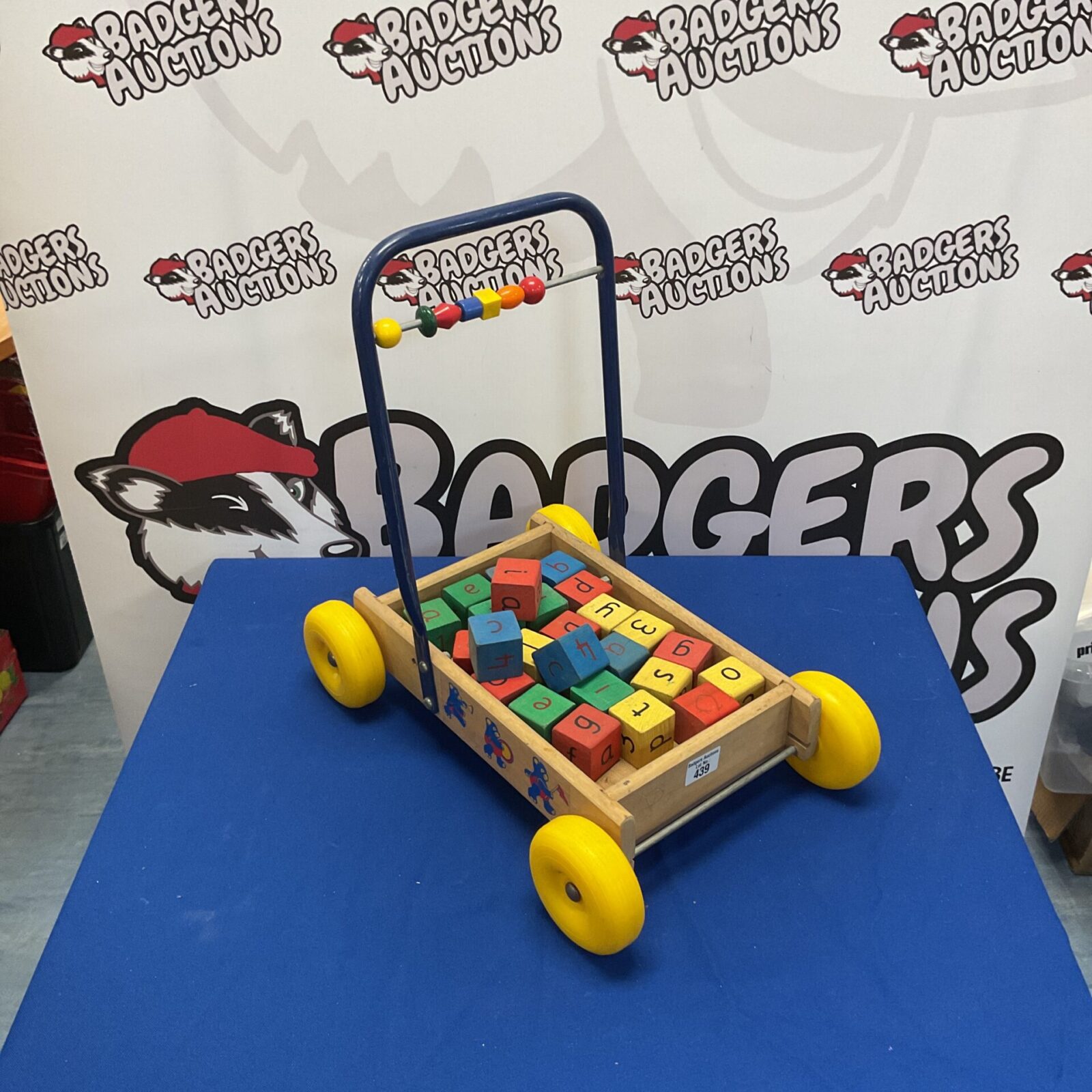 Childrens wooden trolley with letter blocks – Badgers Auctions