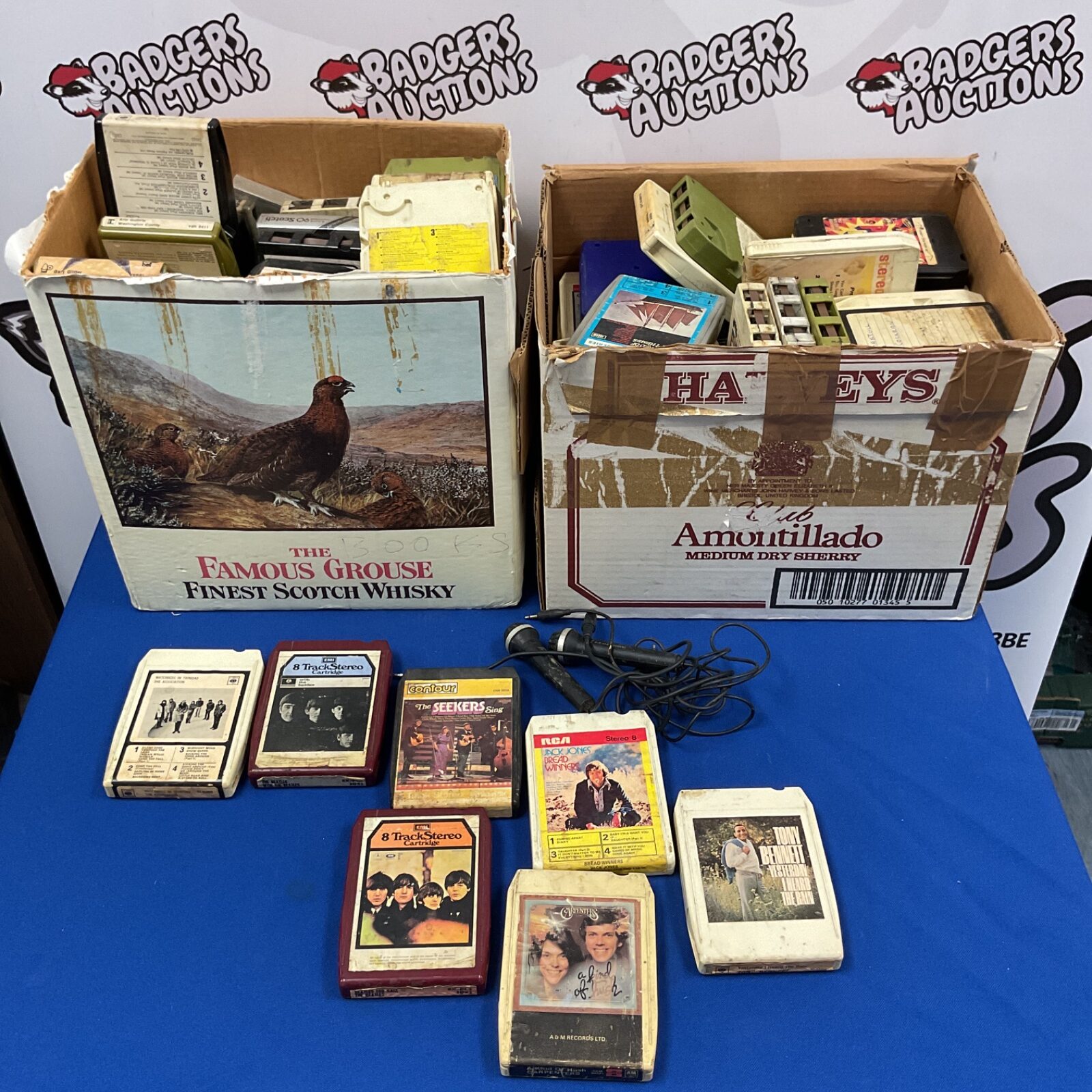 Two boxes full of vintage 8 track stereo carriages inc The beatles ...